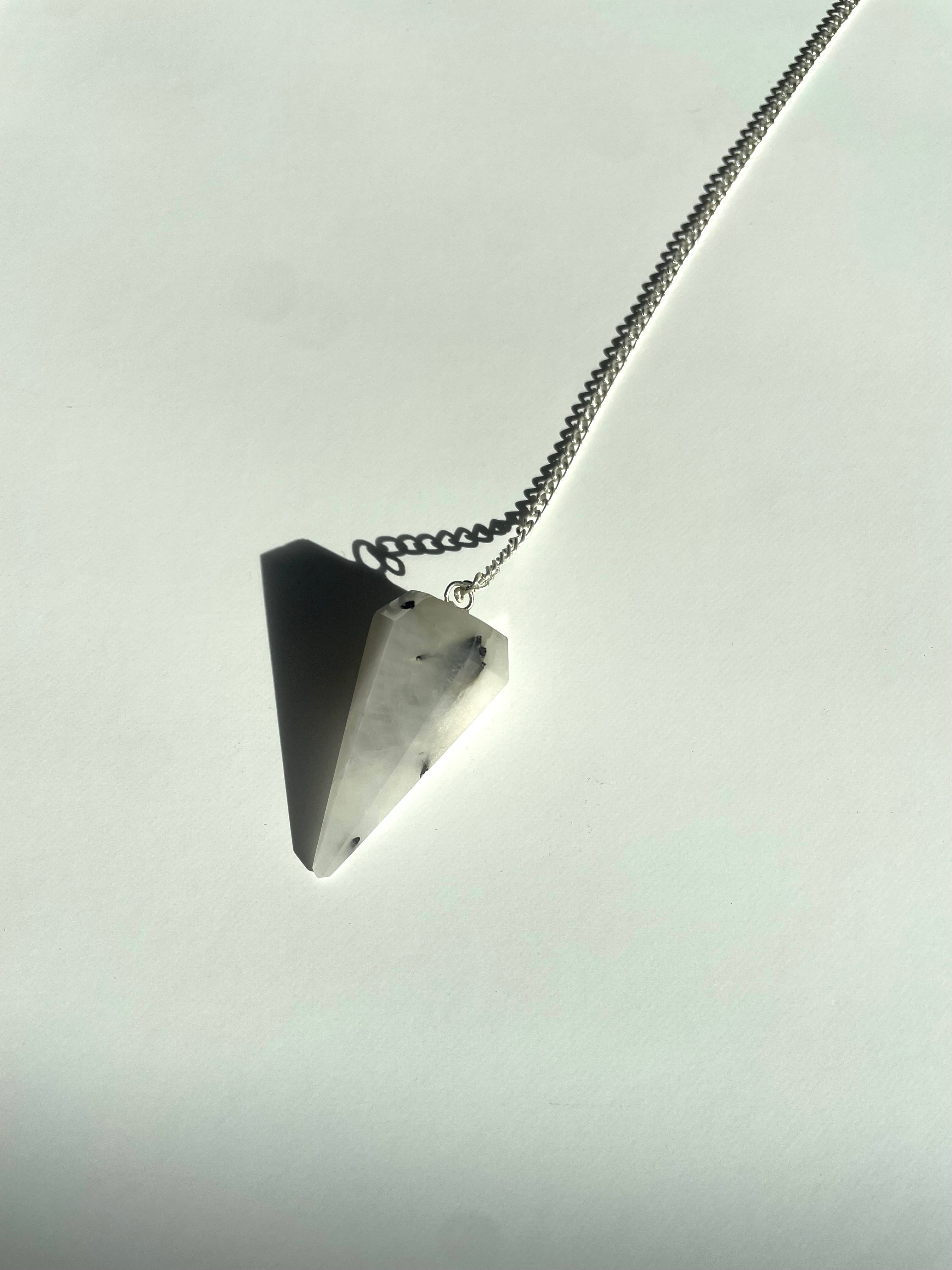 Clear Quartz with Tourmaline Inclusion Pendulum – My Metaphysical Maven